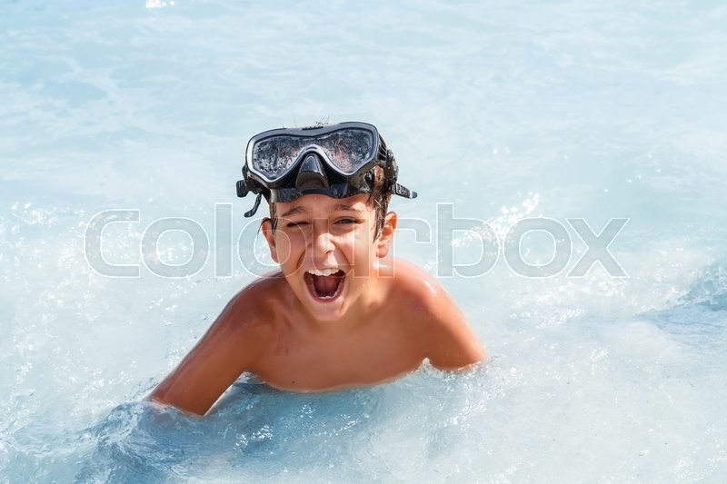 Portrait of a young boy in the sea | Stock image | Colourbox