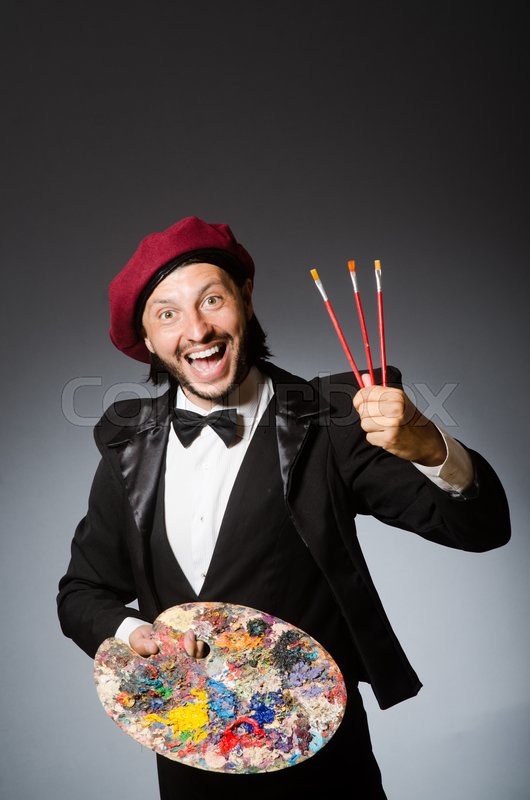 Funny artist working in the studio | Stock image | Colourbox