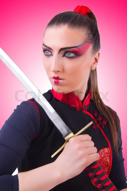 Woman in japanese martial art concept | Stock Photo | Colourbox