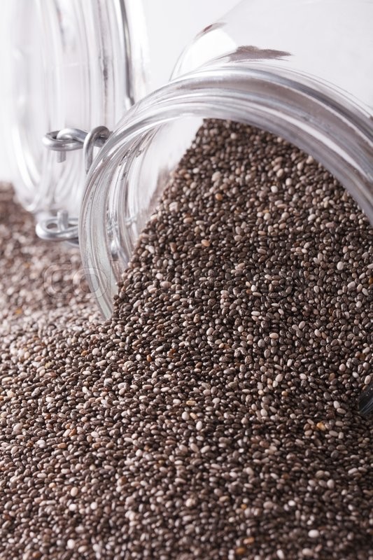 Healthy Chia seeds macro spill out of ... | Stock image | Colourbox