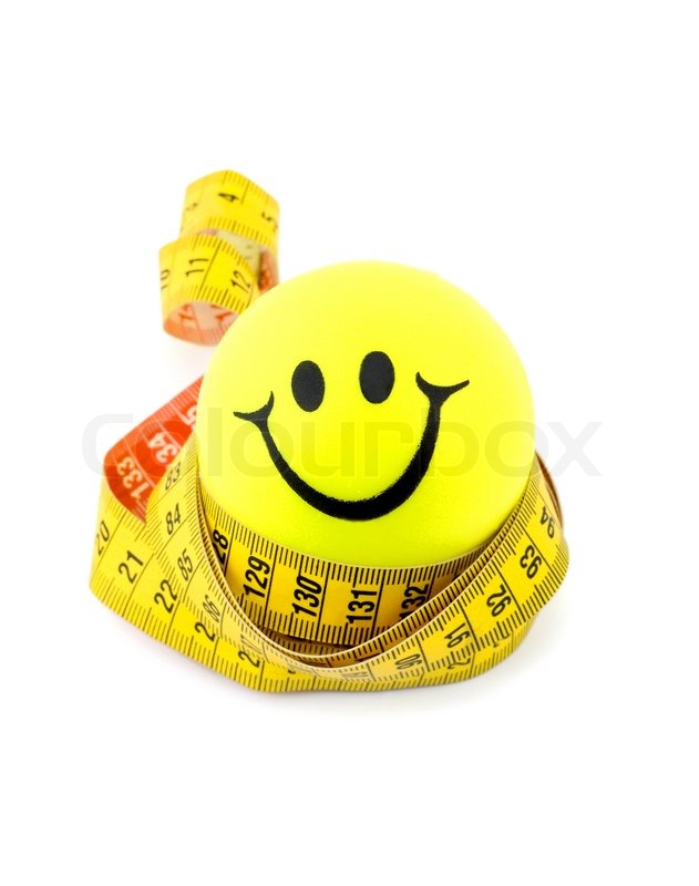 Yellow smiley ball and tape measure ... | Stock image | Colourbox