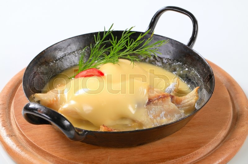 Pan-seared white fish with rich ... | Stock image | Colourbox