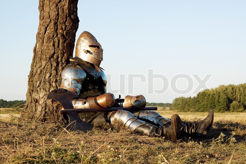 Medieval knight in the field with an ... | Stock image | Colourbox