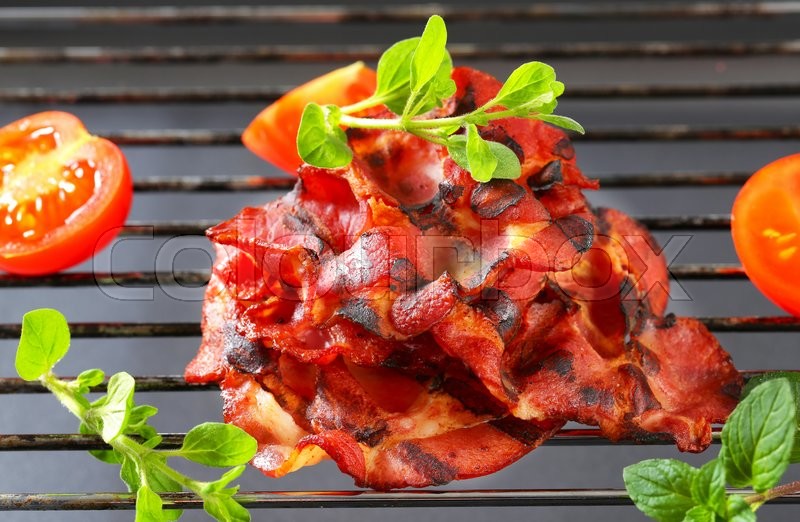 Crispy bacon on barbecue grill | Stock image | Colourbox
