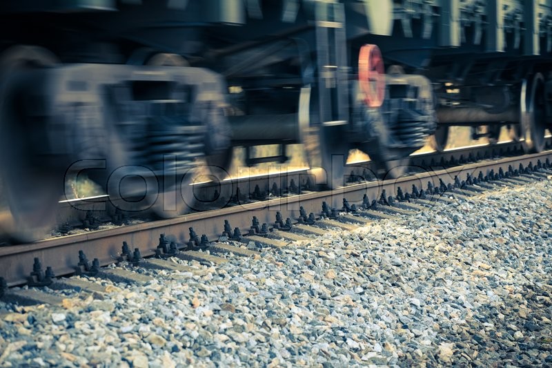 Blurred motion of spinning train wheels ... | Stock image | Colourbox