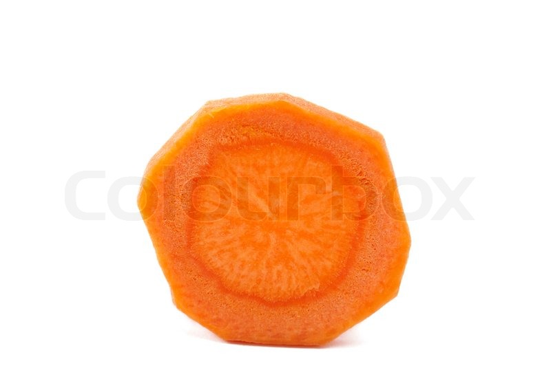 Carrots cut into circles on a white ... | Stock image | Colourbox