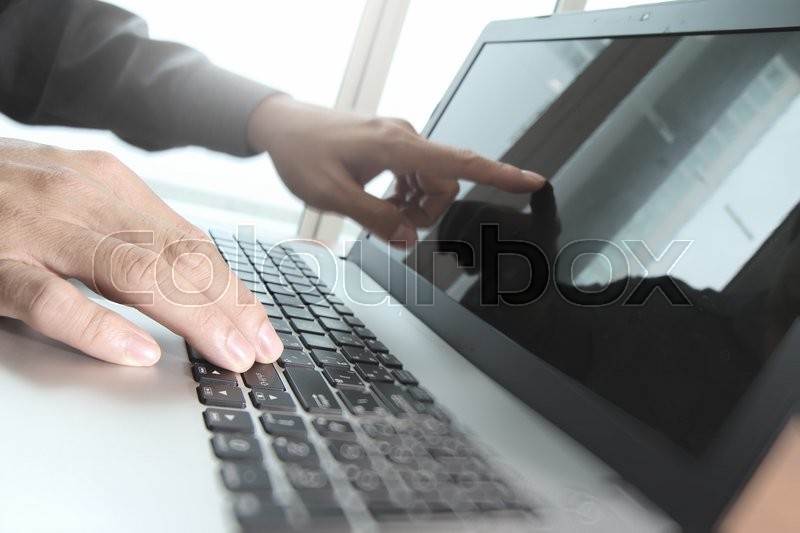 Close up of business man hand working ... | Stock image | Colourbox