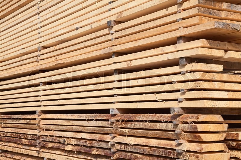 Stack of new wooden studs at the lumber ... | Stock Photo | Colourbox