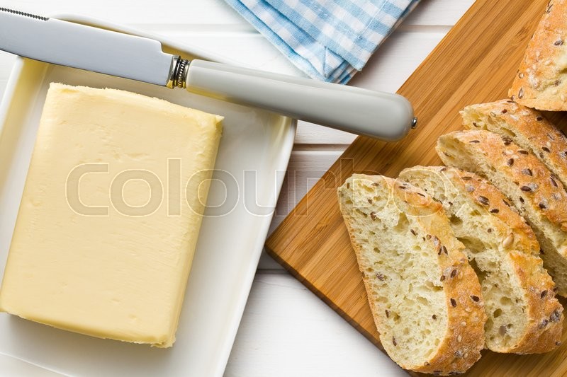 Top view of cube of butter with sliced ... | Stock image | Colourbox