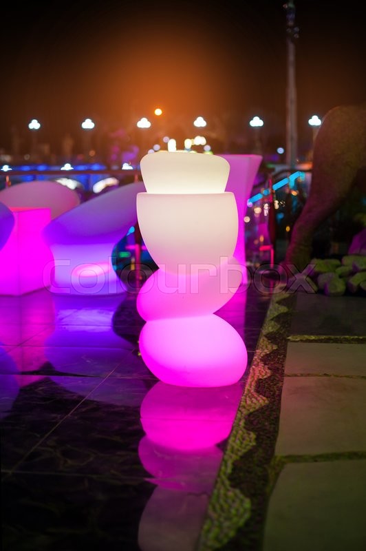 Interior evening cafe with neon lights | Stock image | Colourbox