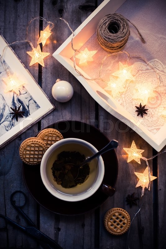 Winter holiday background: cup of tea, ... | Stock image | Colourbox
