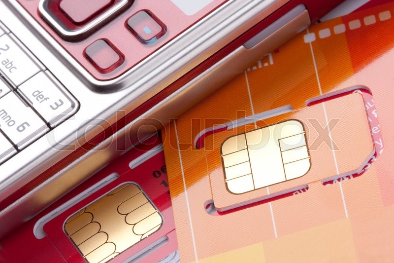 Close-up of mobile phone with sim cards | Stock image | Colourbox
