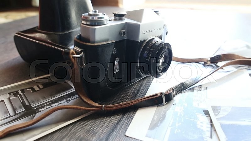 Old camera on a wooden table close up, ... | Stock video | Colourbox