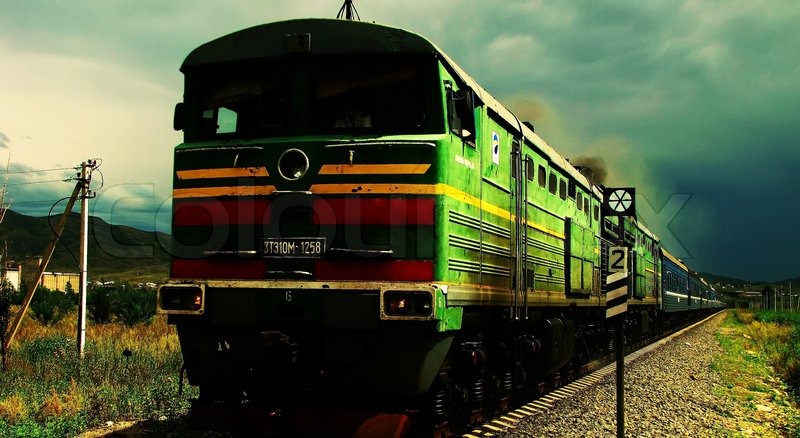 High speed green train on the railway, ... | Stock image | Colourbox