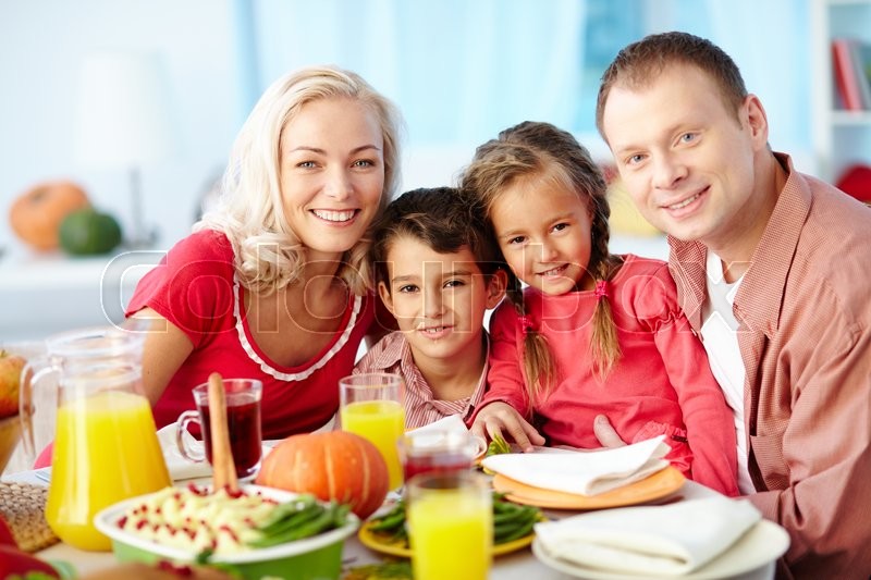 Caucasian family sharing meal at home | Stock image | Colourbox