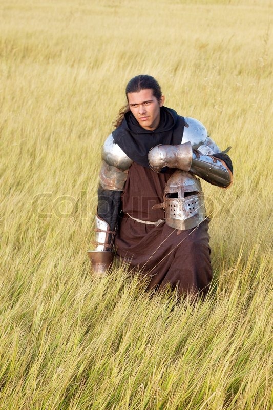 Medieval knight in the field with a ... | Stock image | Colourbox