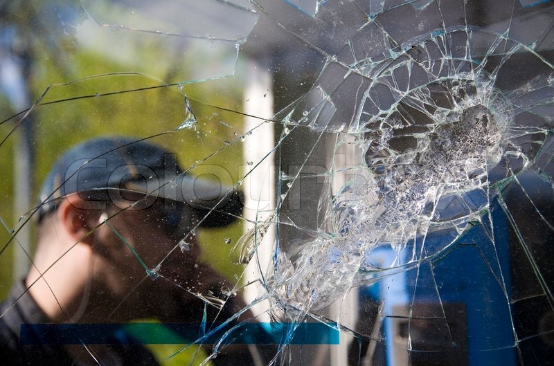 Looking through broken window. ... | Stock Photo | Colourbox