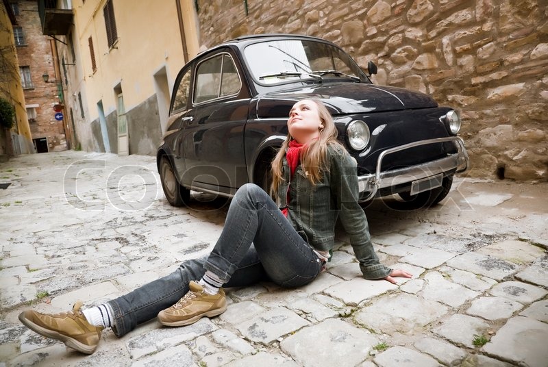 Beauty Woman Sitting Against Retro Car. ... | Stock image | Colourbox