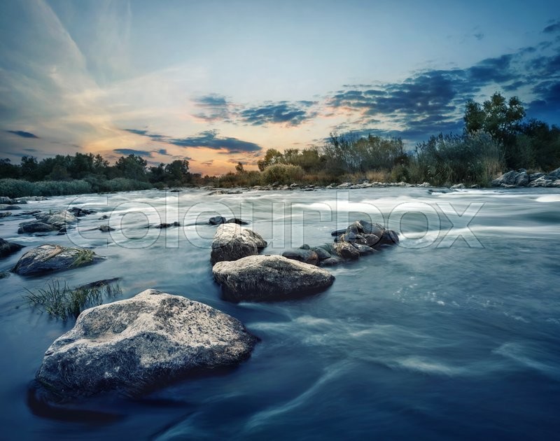 River Stones Background Sunset