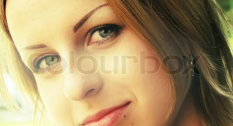 Smiling mysterious woman pretty face | Stock image | Colourbox