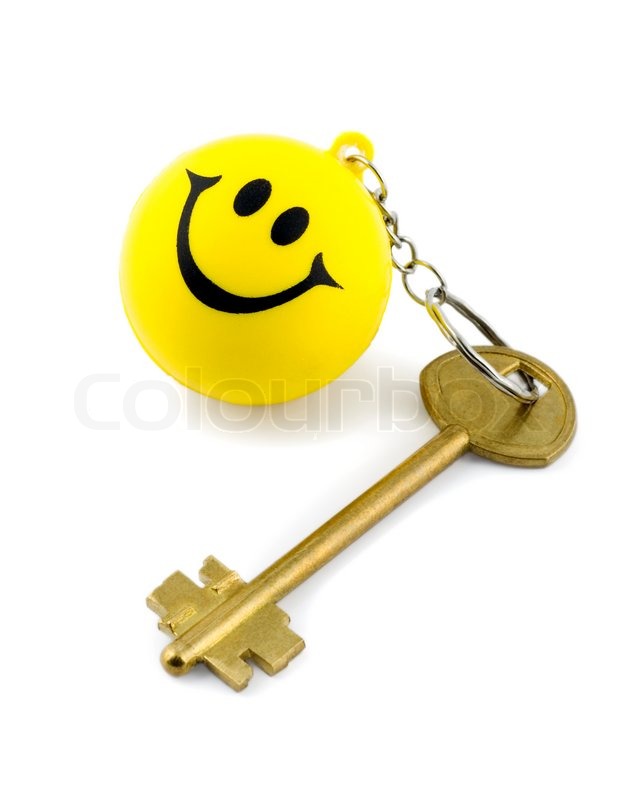 Golden key on key ring smiles isolated ... | Stock image | Colourbox