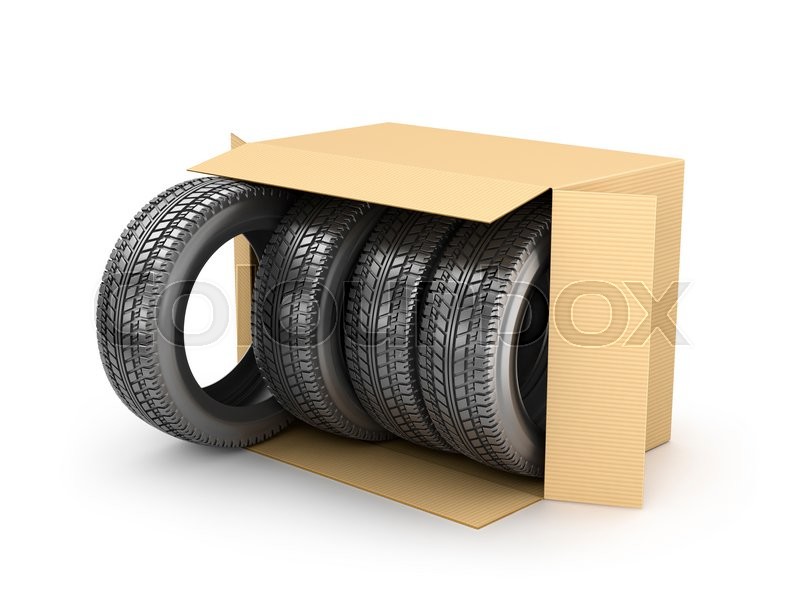 Four tires in an open cardboard box, ... | Stock image | Colourbox