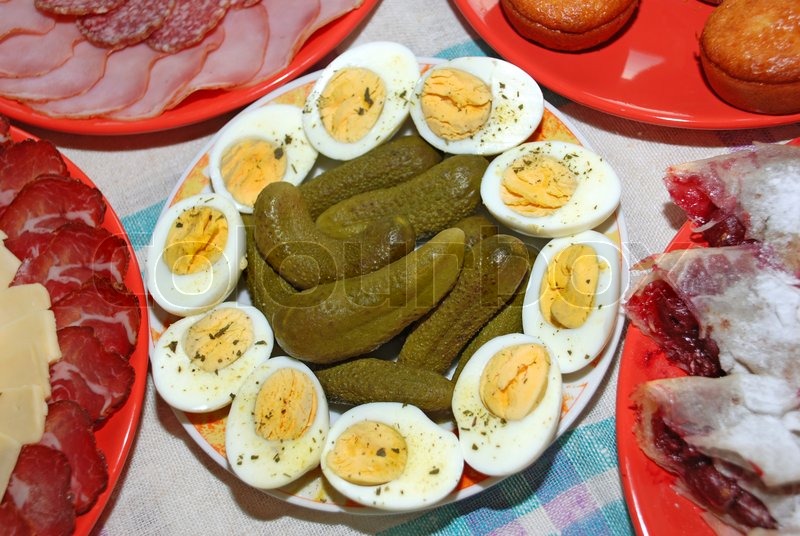 Green cucumbers with boiled eggs served ... | Stock image | Colourbox