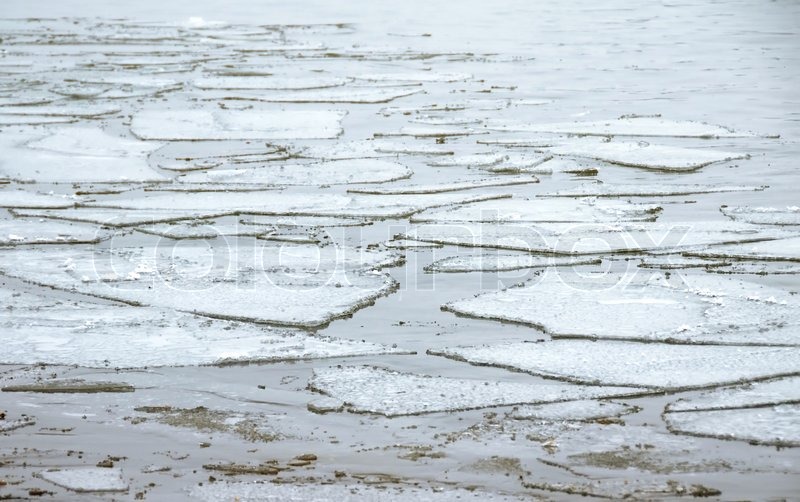 Ice floating on water surface seasonal ... | Stock image | Colourbox
