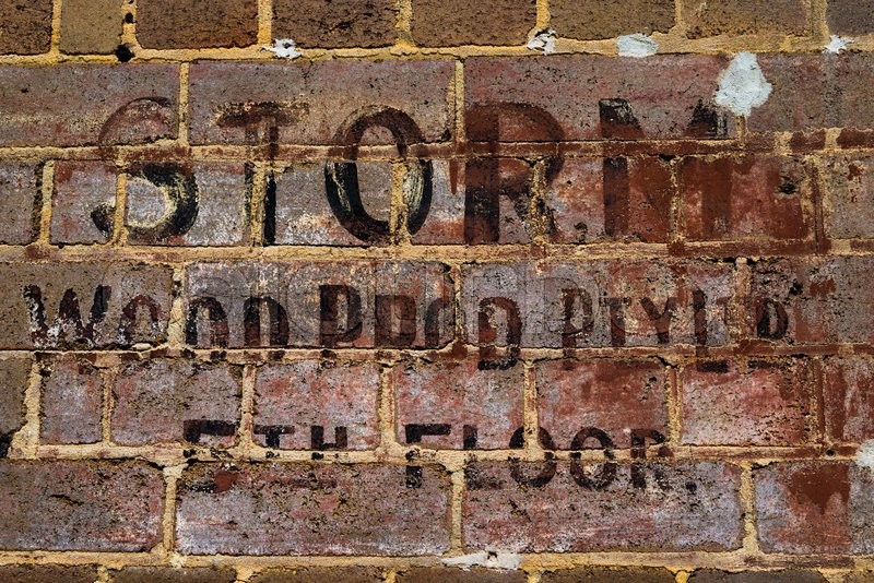 Vintage writing on brick wall | Stock Photo | Colourbox