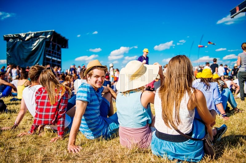 Group of beautiful teens at concert at ... | Stock Photo | Colourbox