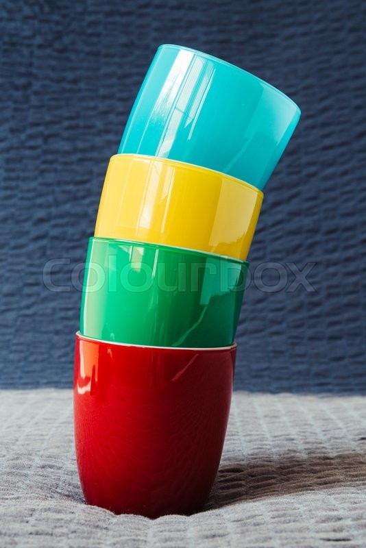 Stack of colorful coffee cups on grunge ... | Stock image | Colourbox