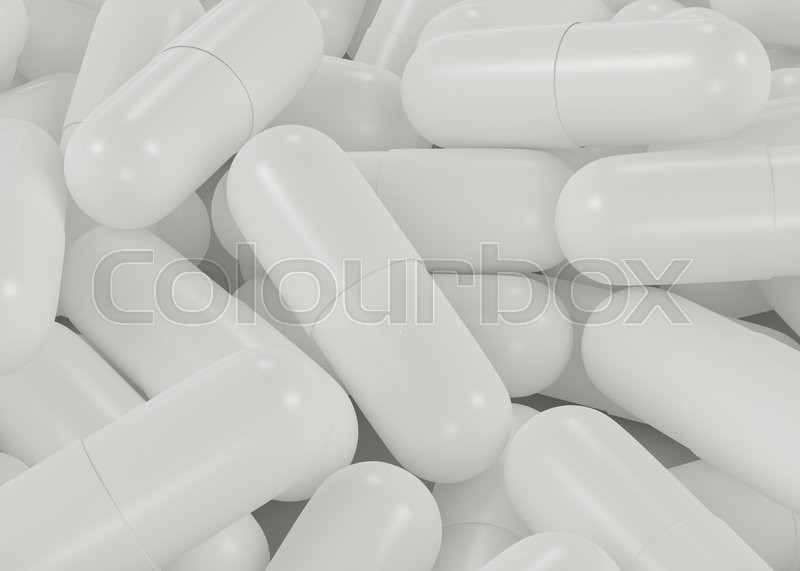 White capsules isolated on white with ... | Stock image | Colourbox