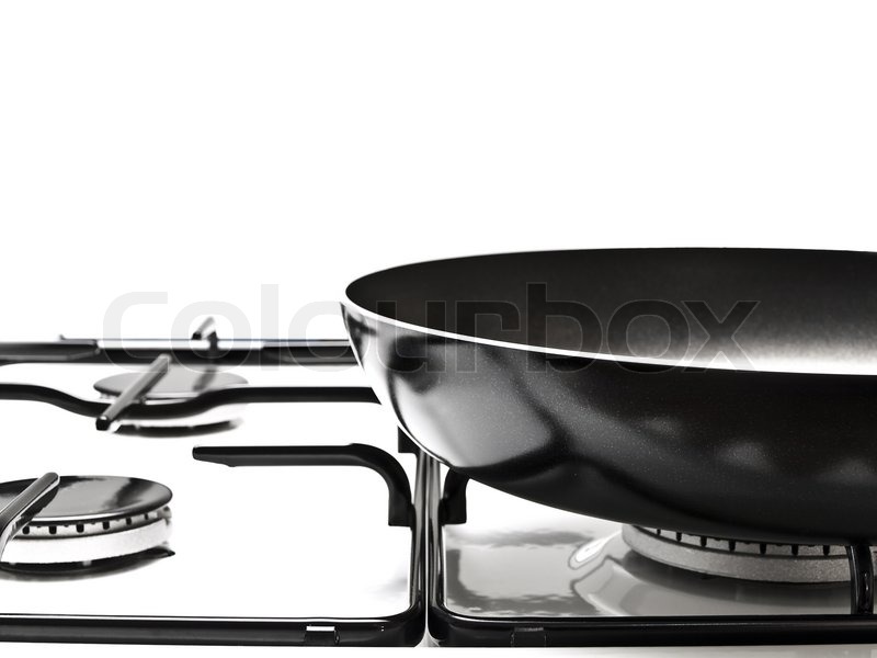 Frying pan at the white gas stove over ... | Stock image | Colourbox