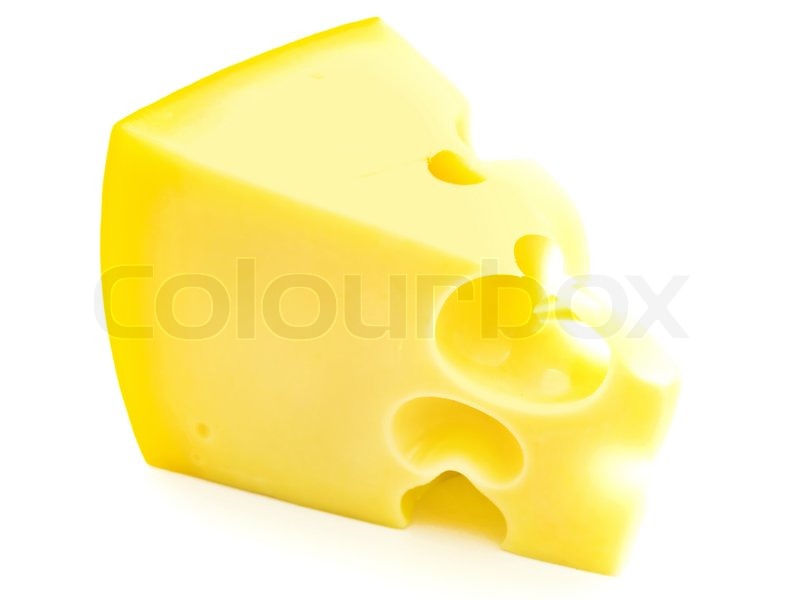 Velsmagende gule stykke ost mod den ... | Stock foto | Colourbox