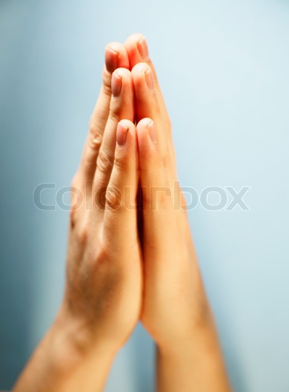 Hands Clasped in a prayer. | Stock image | Colourbox