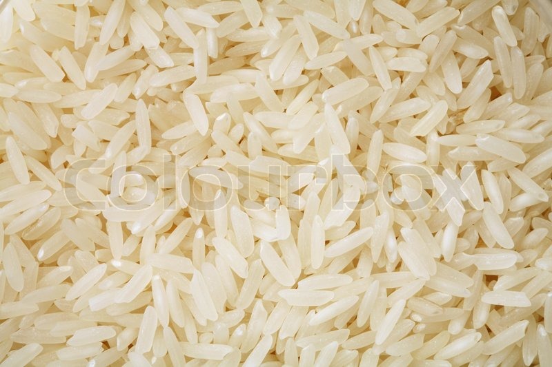 Uncooked rice texture | Stock image | Colourbox
