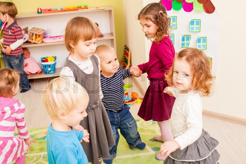 Group of little children dancing with ... | Stock image | Colourbox