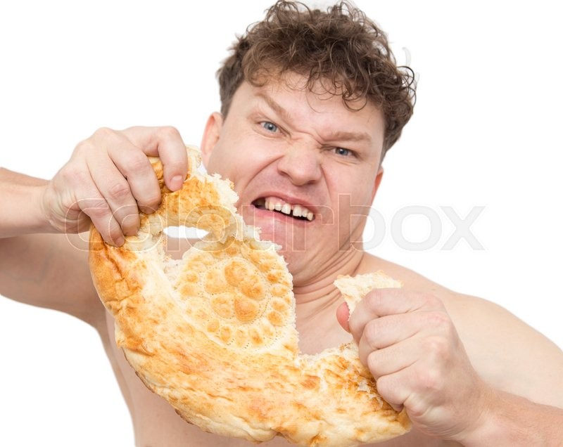 Man with bread on a white background | Stock image | Colourbox