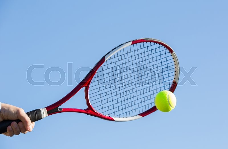 Tennis player hitting the ball on a ... | Stock image | Colourbox