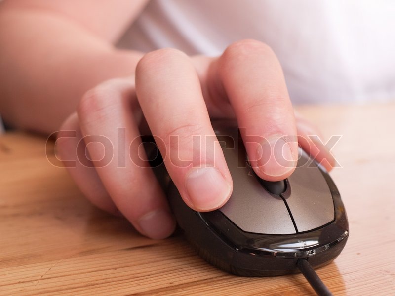 Handling a mouse of a computer | Stock Photo | Colourbox