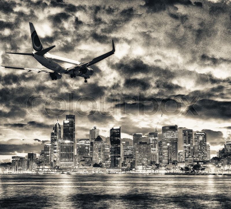 Airplane over Sydney Buildings. Tourism ... | Stock image | Colourbox