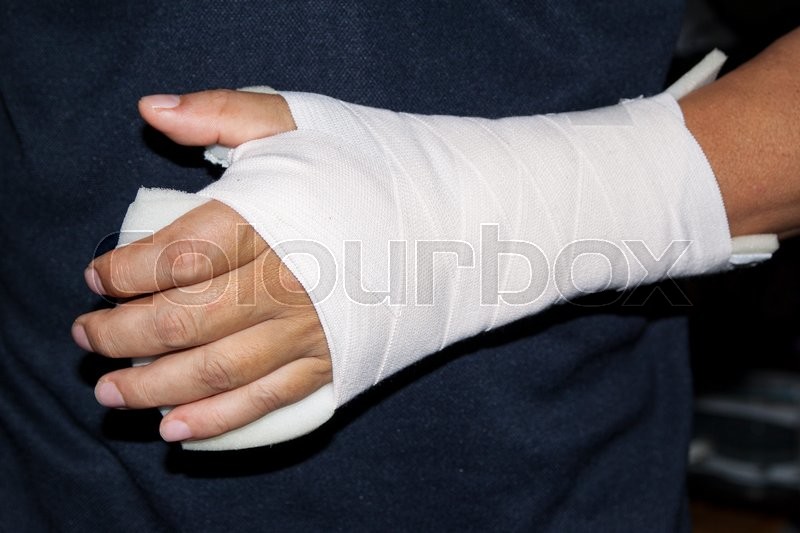 Wrist injury supprted with splint | Stock image | Colourbox