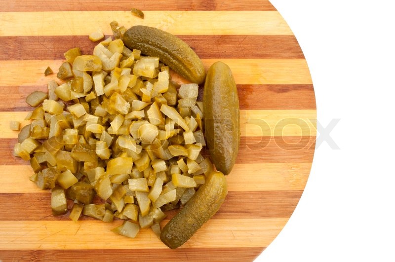 Sliced pickles on the board isolated on ... | Stock image | Colourbox