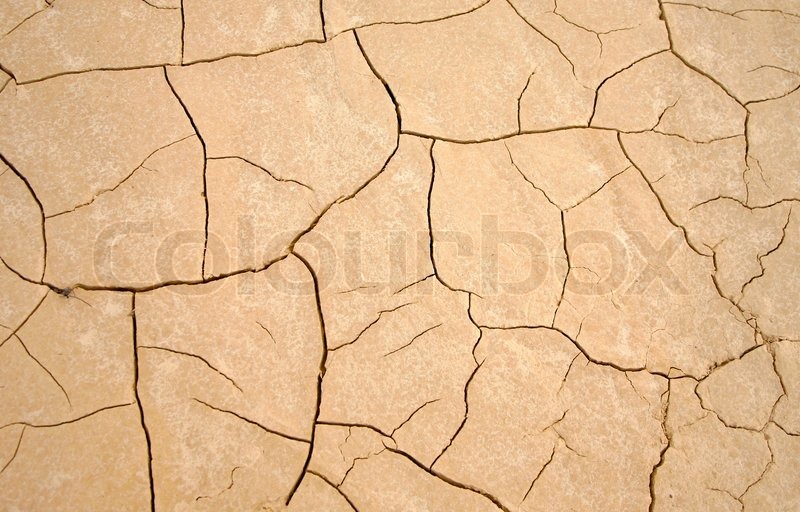Dry yellow textured and cracked sand | Stock image | Colourbox