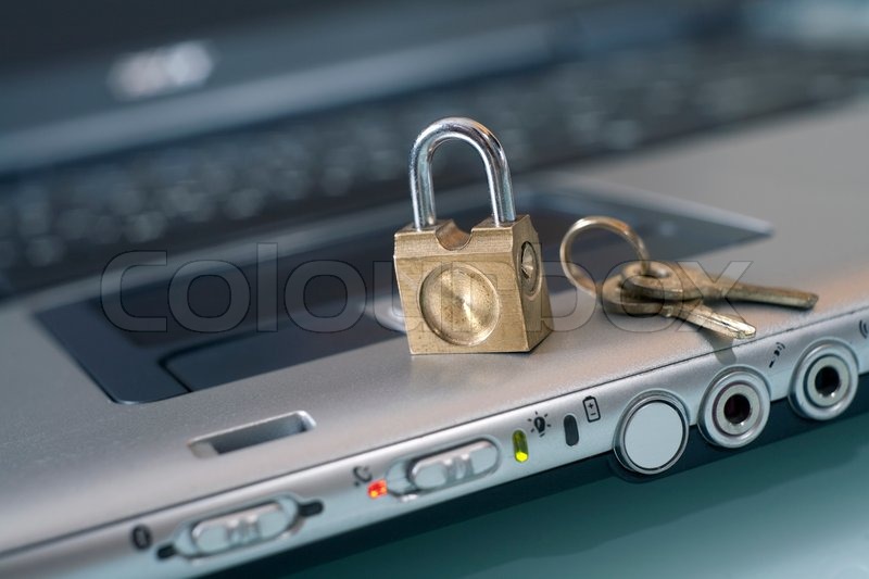 Padlock with keys on a laptop | Stock image | Colourbox