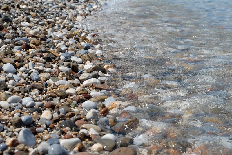 Pebbly shingly shore of red sea | Stock image | Colourbox