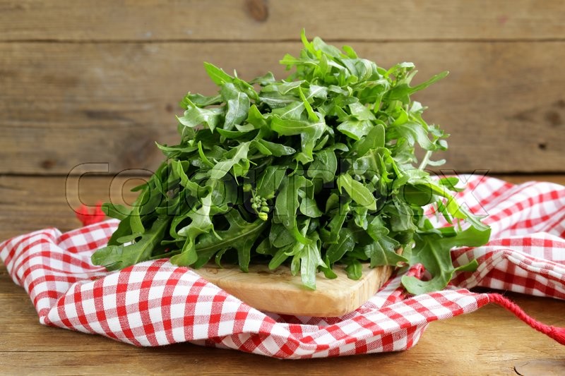 Large bunch of arugula green salad on a ... | Stock image | Colourbox