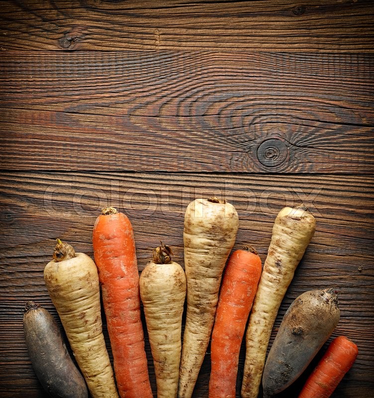 Various root vegetables on wooden ... | Stock image | Colourbox