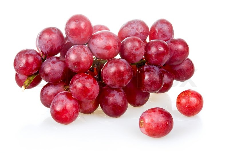 Bunch of ripe pink grapes isolated on ... | Stock image | Colourbox