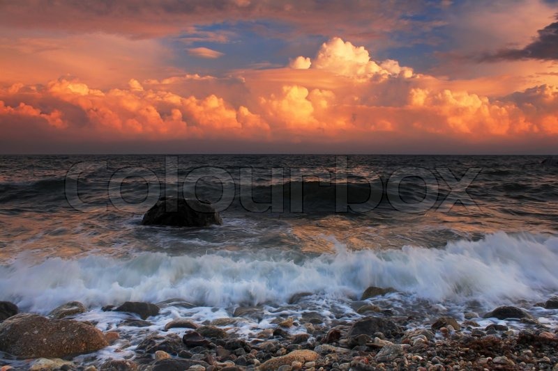 Colorful sunset over the ocean beach | Stock image | Colourbox